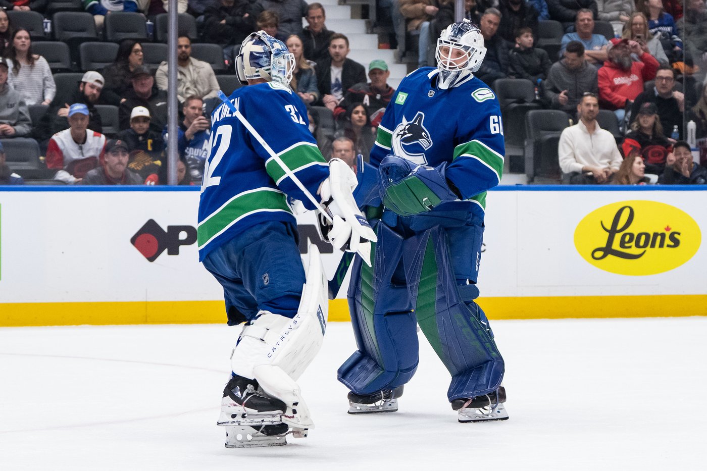 Beleaguered Vancouver Canucks show fight in loss to high-powered ...