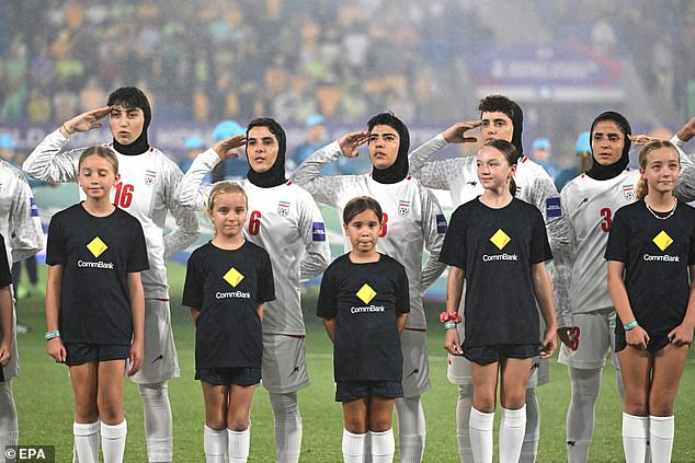 Iran football stars backflip on national anthem with telling gesture ...