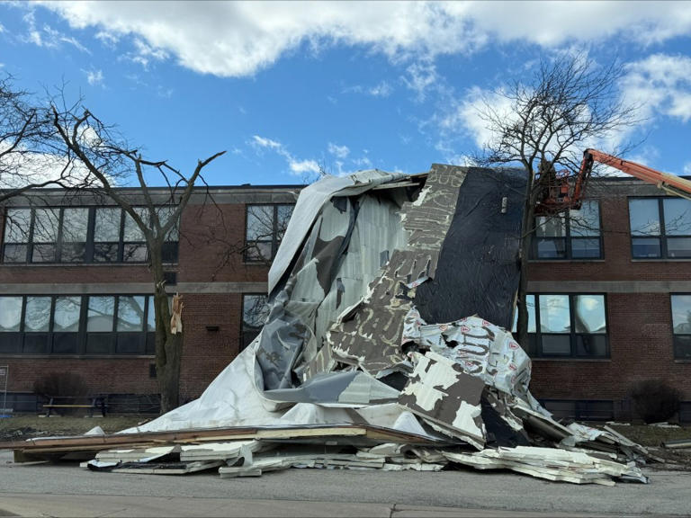 Powerful winds sweep through Niles, tearing roof off high school