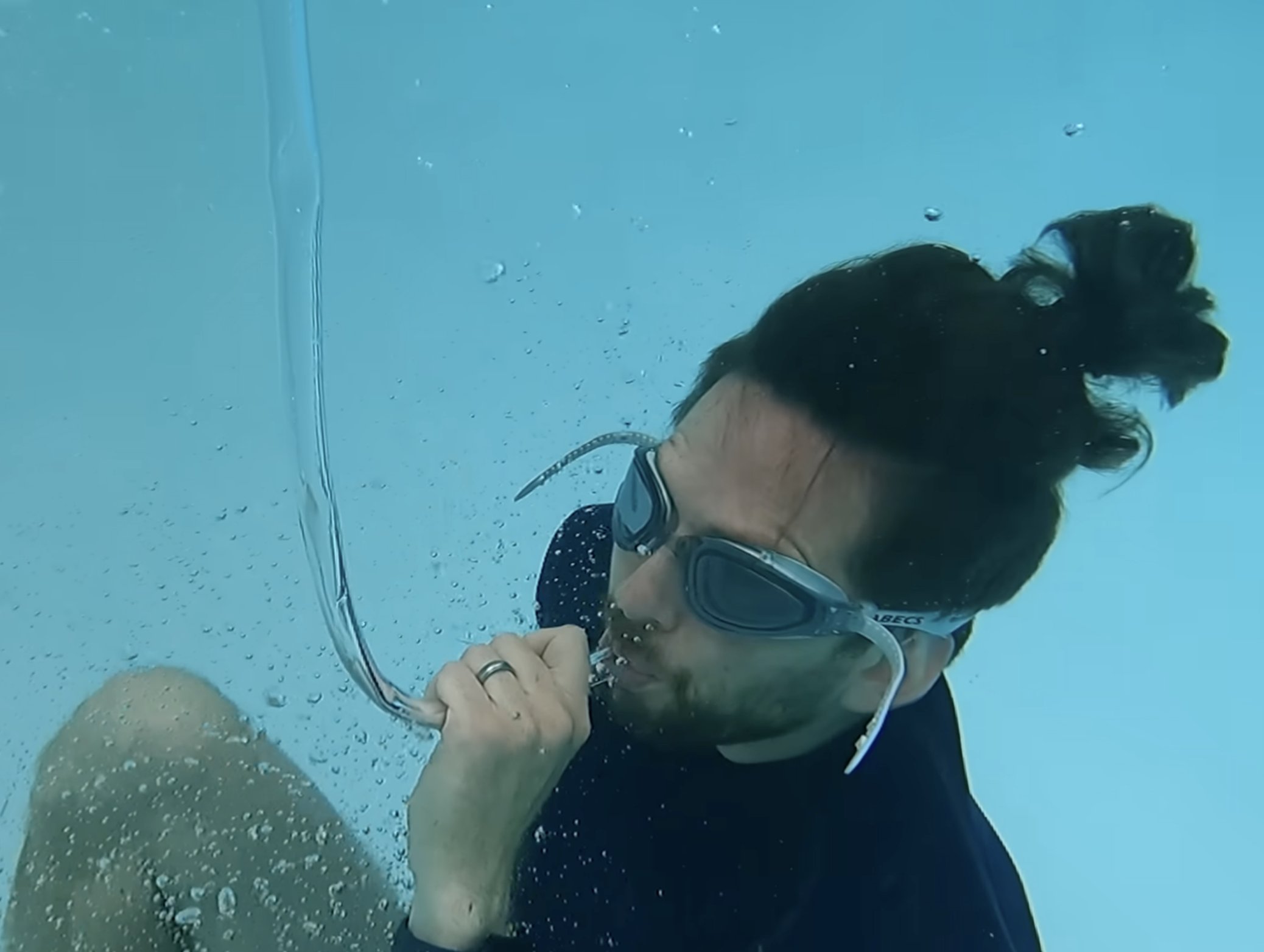 Is it really impossible to breathe through a tube underwater?