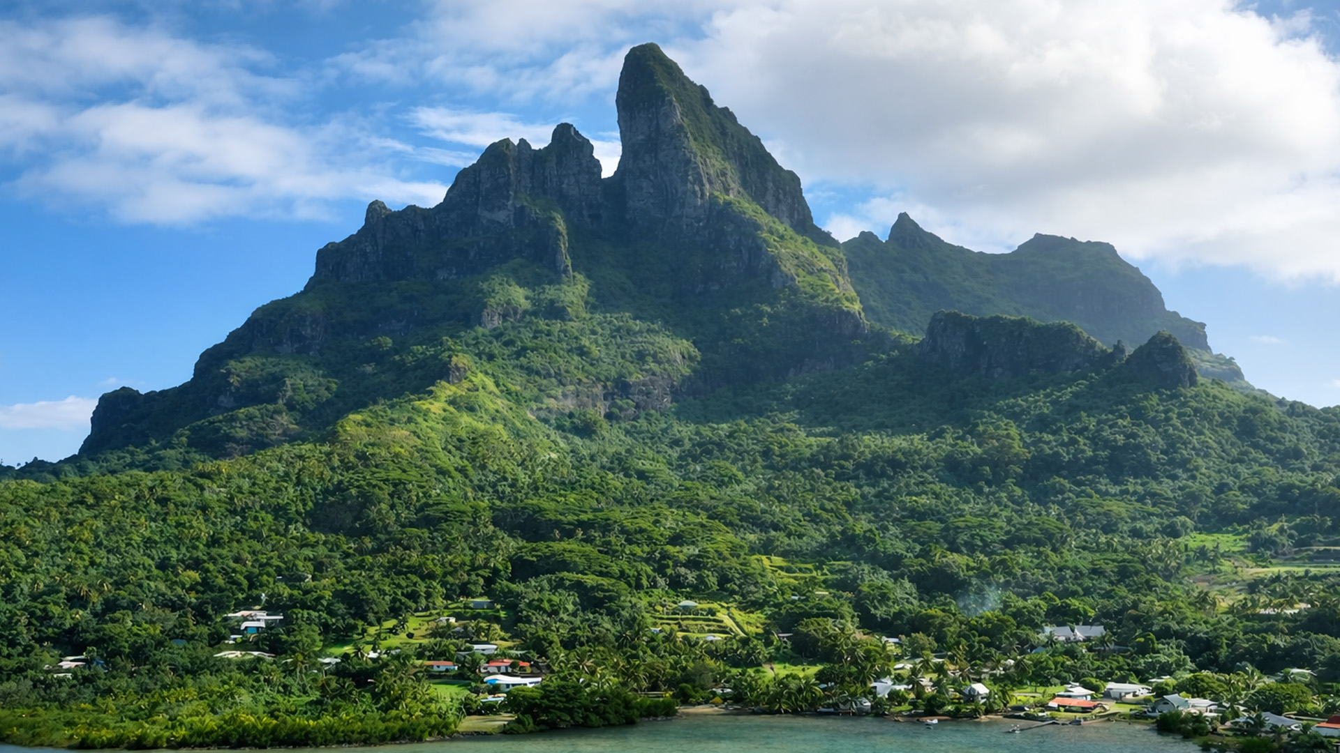A quiet island beneath a volcanic giant