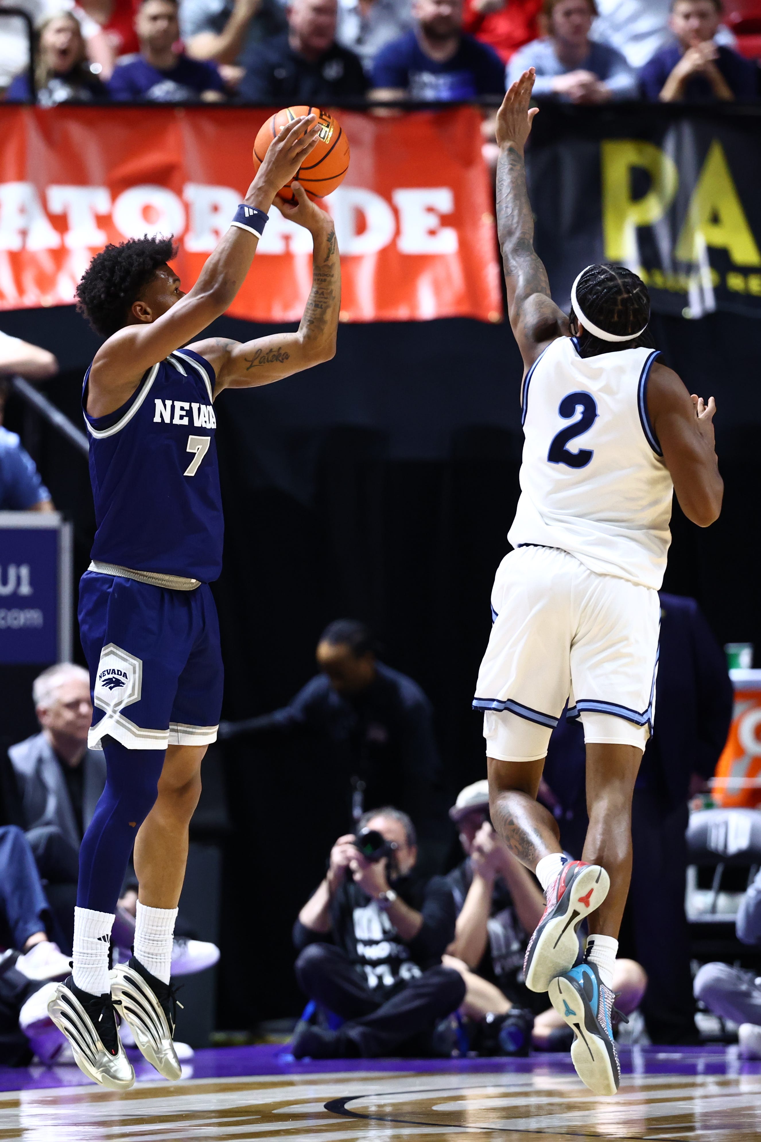 Utah State takes 79-66 win to eliminate Nevada from conference tournament