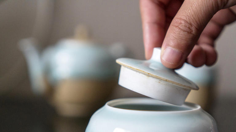 DIY unique hanging planters from thrifted teapot lids