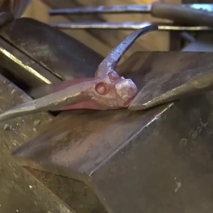 Figure carving: ram’s head hook