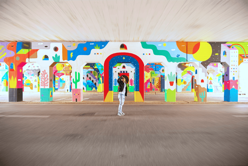 The 10,000-sq-ft mural scavenger hunt hidden under a railroad bridge in ...