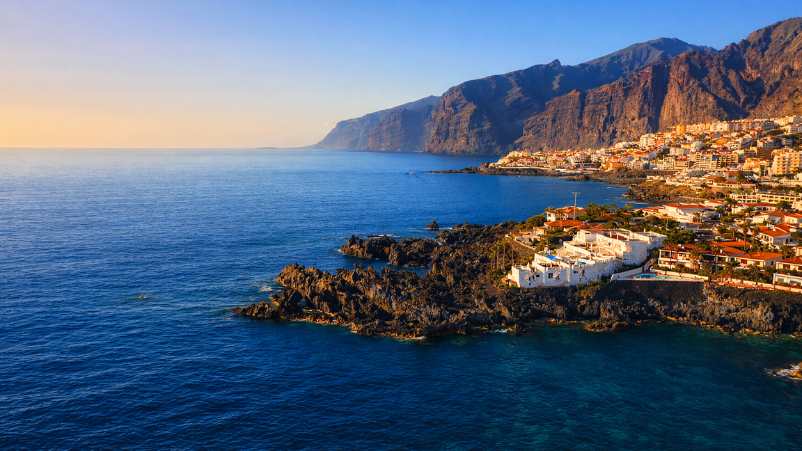Beautiful seaside town surrounded by ocean and towering rock walls