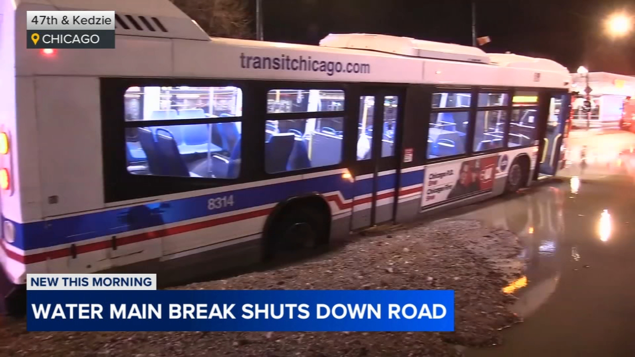 CTA bus partially submerged in flooded street amid main break on SW Side