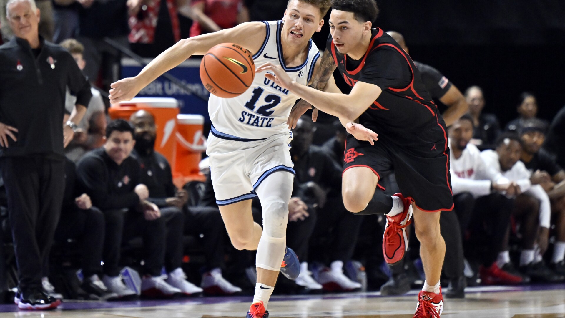 Collins scores 20 to lead Utah State 73-62 past San Diego State to ...