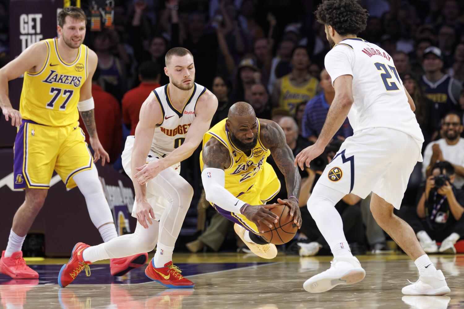 Luka Doncic, Austin Reaves lift Lakers to thrilling overtime win over ...