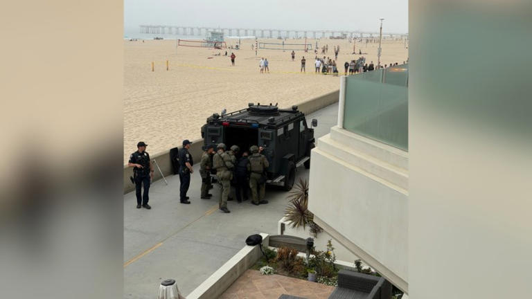 1 found dead, 1 in custody following SWAT team standoff at beachfront ...