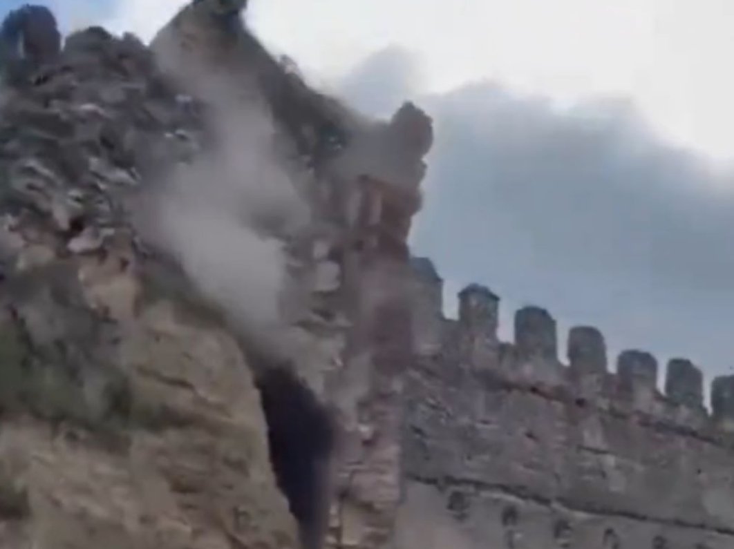 Shocking moment: Historic castle tower suddenly collapses