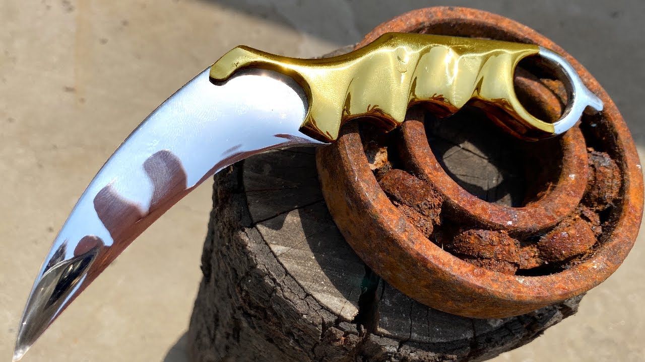 Turning a rusty bearing into a karambit