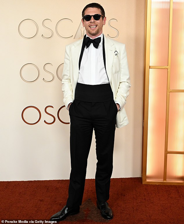 Sinners star Jack O'Connell arrives on the Oscars red carpet with blood ...