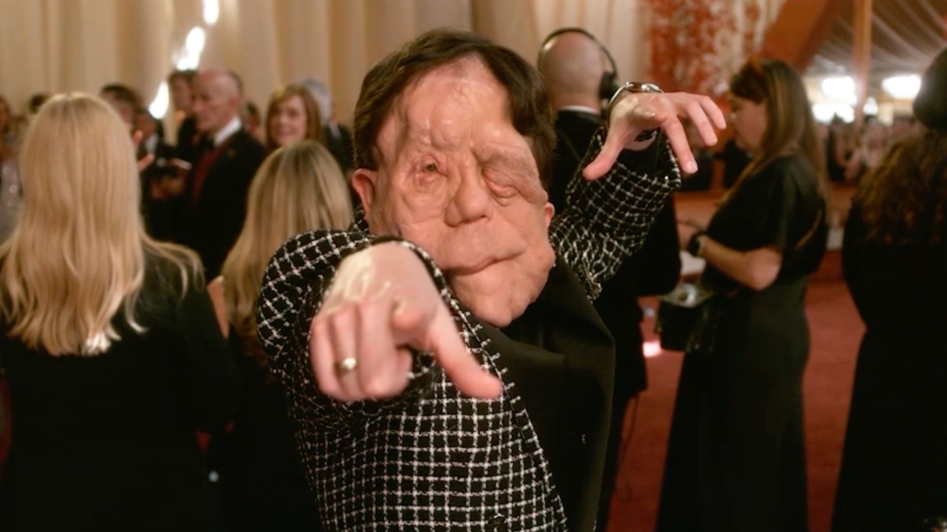 Oscars 2026 GLAMBOT: Adam Pearson