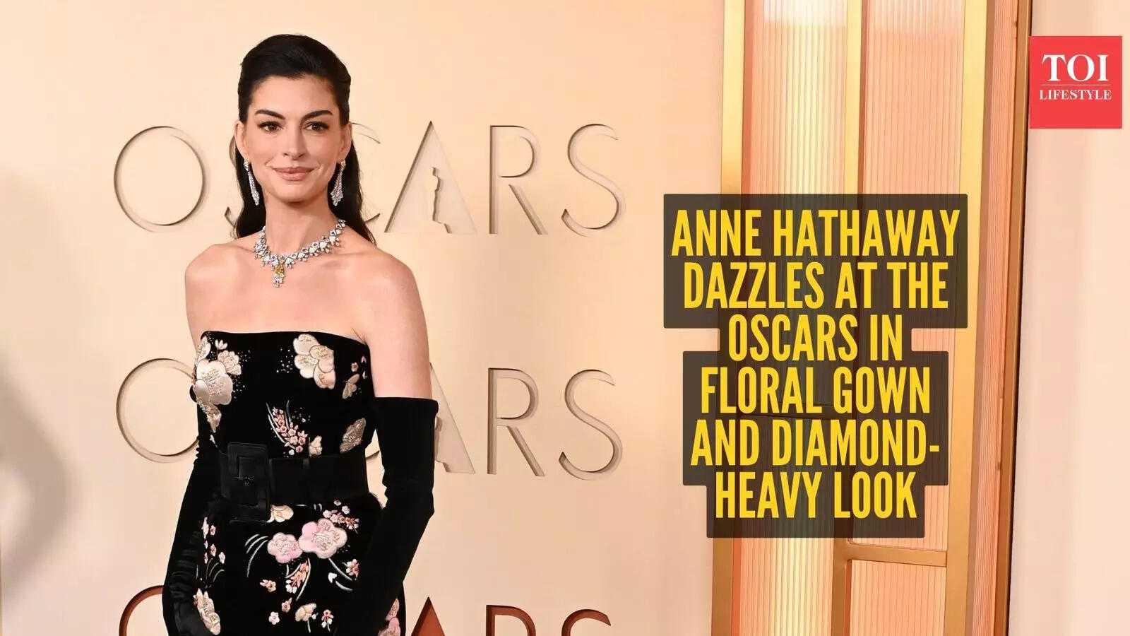 Anne Hathaway owns the Oscars 2026 red carpet in a stunning floral ...