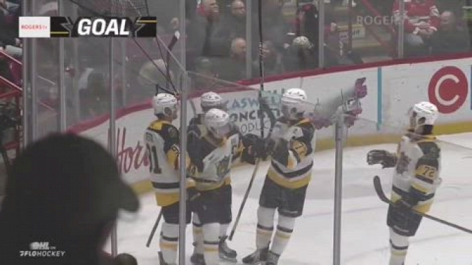 Oops! Goalie Carter George turns puck over to Jake O'Brien for easy goal