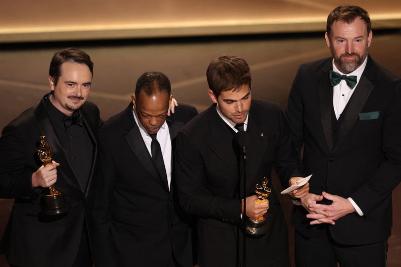 Oscars tie explained as The Singers and Two People Exchanging Saliva ...