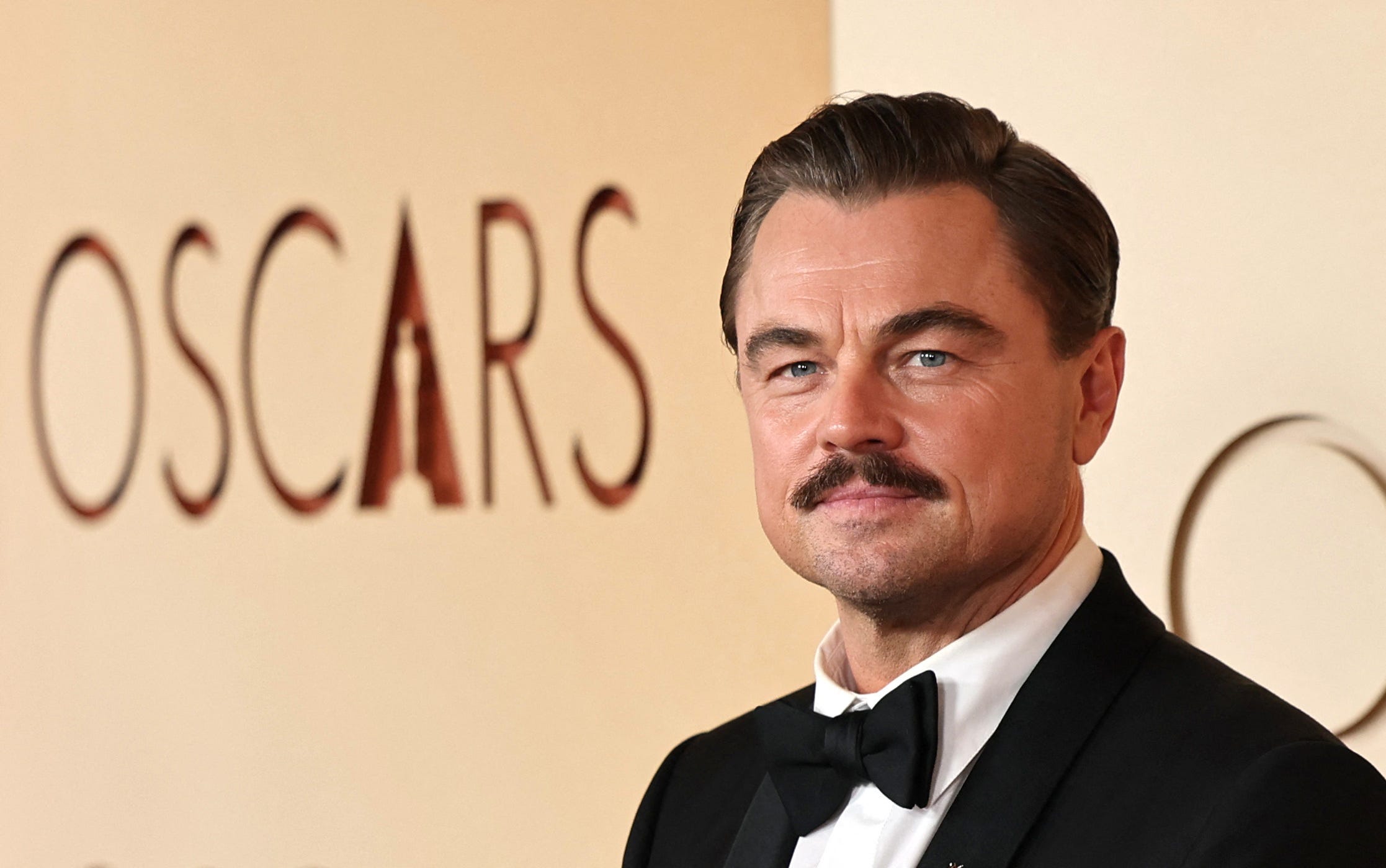 Leonardo DiCaprio brings Vittoria Ceretti as his date to the Oscars