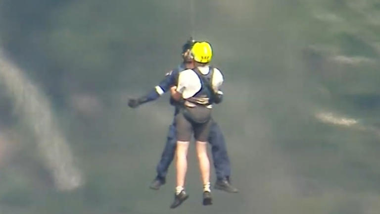 Six teens rescued from Gold Coast mountain day after fatal cliff fall
