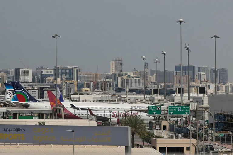 Emirates flights cancelled from Dubai Airport after drone strike causes ...