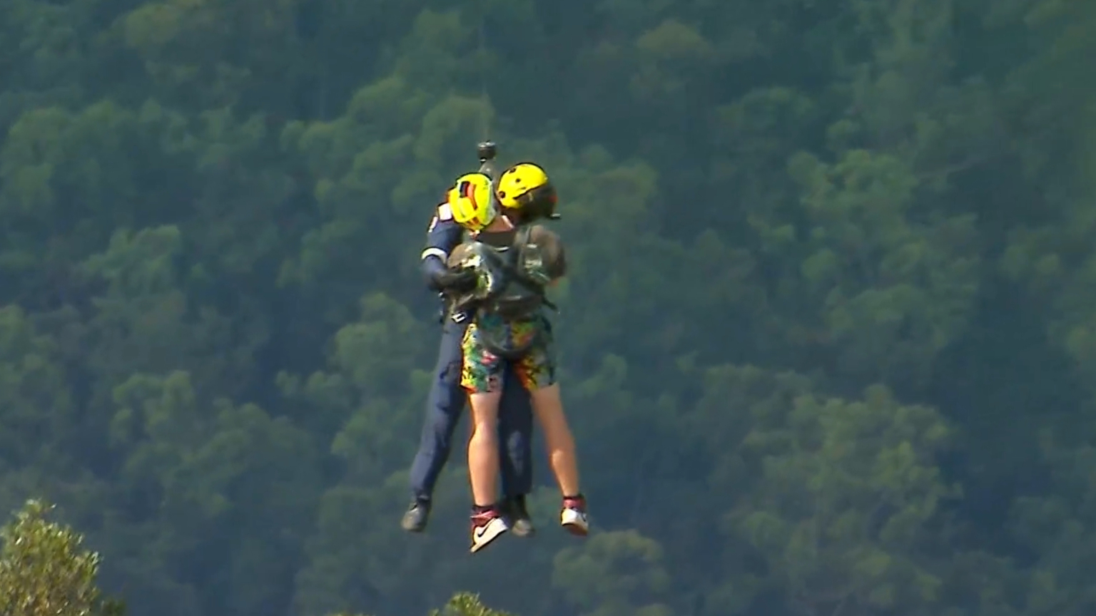 Six teens rescued from Gold Coast mountain day after fatal cliff fall