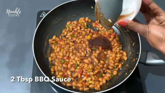 How to flavor and cook canned baked beans for a tastier meal