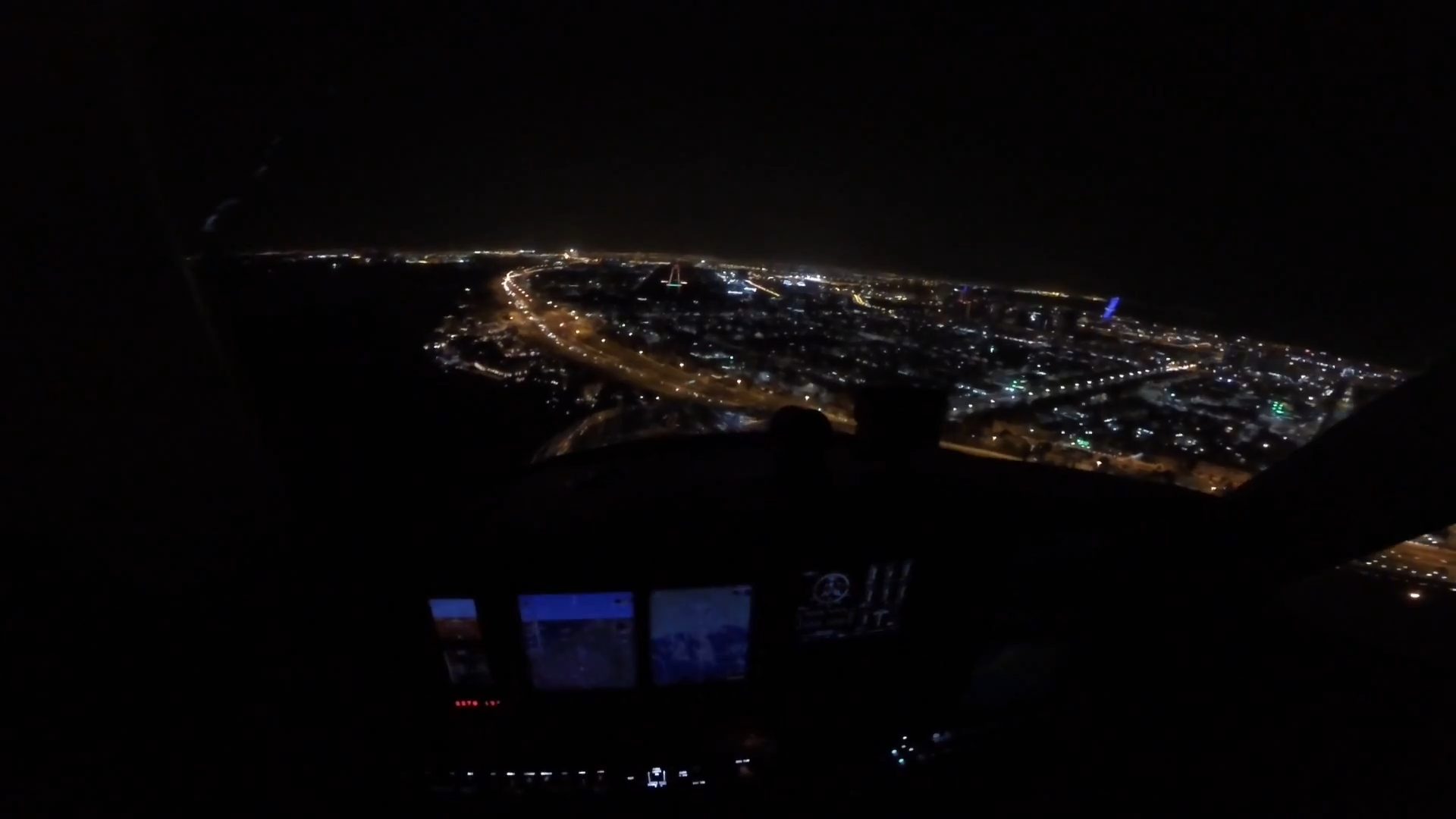Watch the cockpit view of a night approach into Abu Dhabi