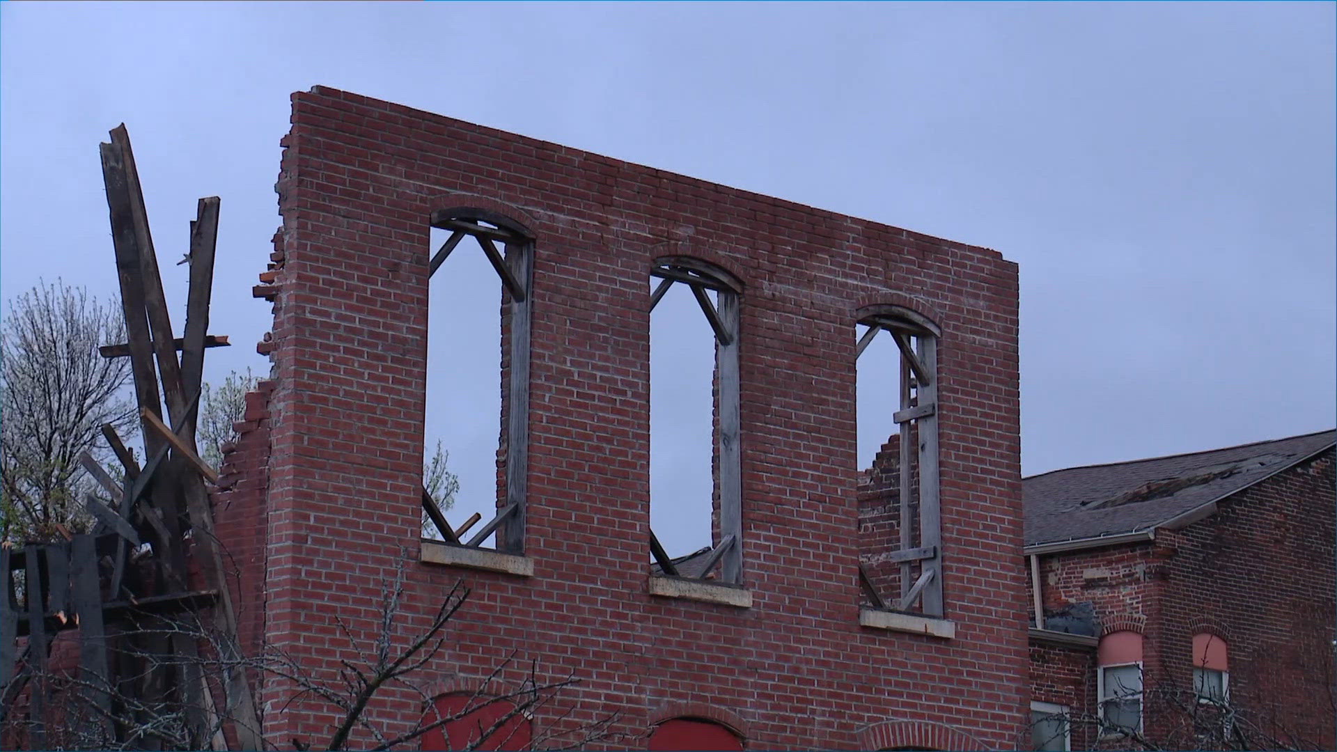 Family displaced after vacant building collapses onto their home