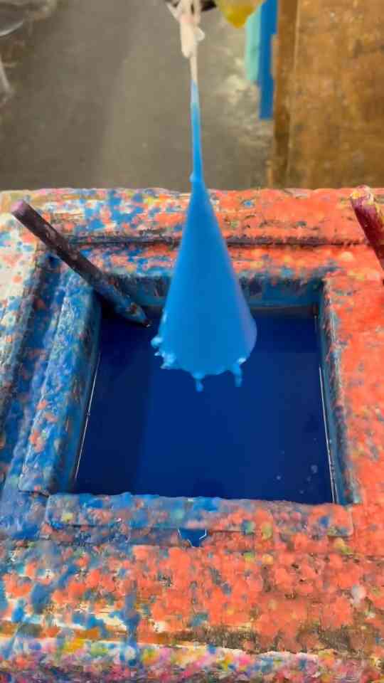 Candle dipping creates perfect wax layers