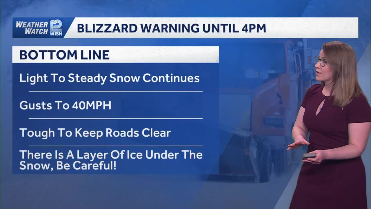 Light snow continues along with strong wind