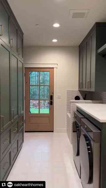 This laundry room is total goals: stunning cabinet color and dog ...