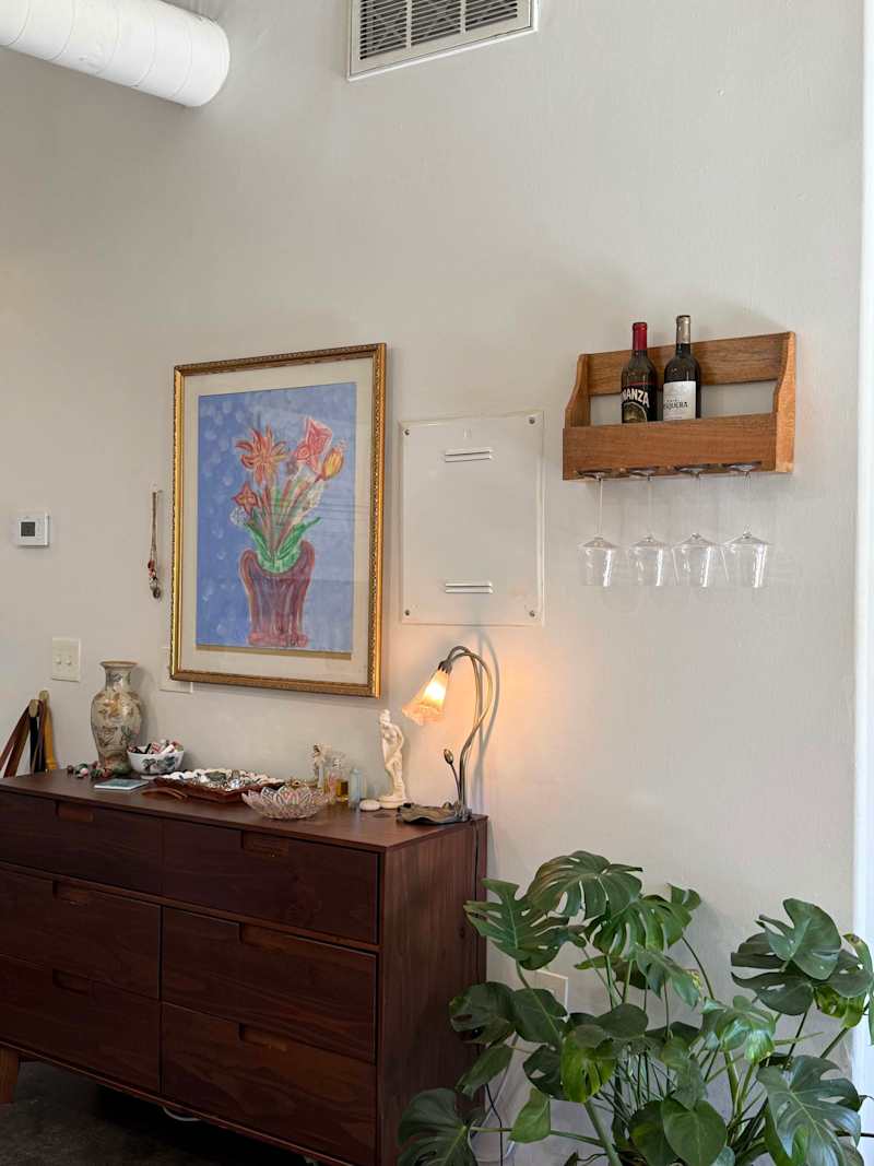 This 400-square-foot studio apartment has a massive balcony