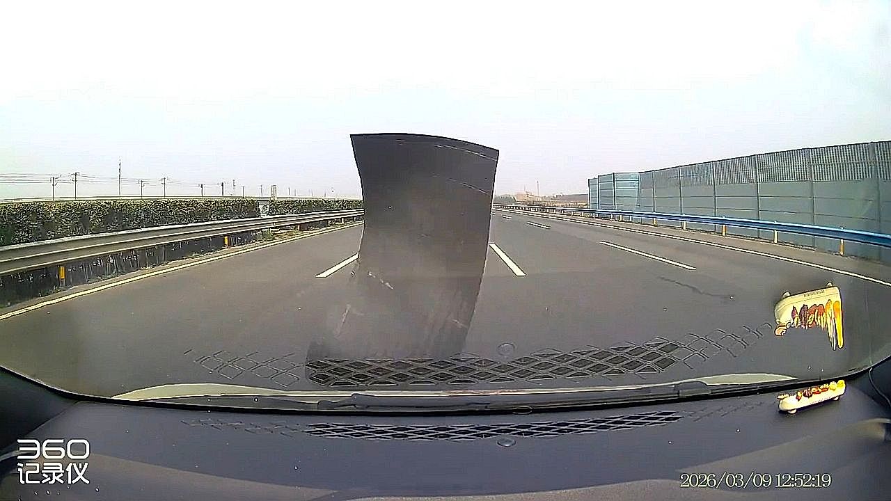 Highway driver faces sudden hazard when debris slams into windshield