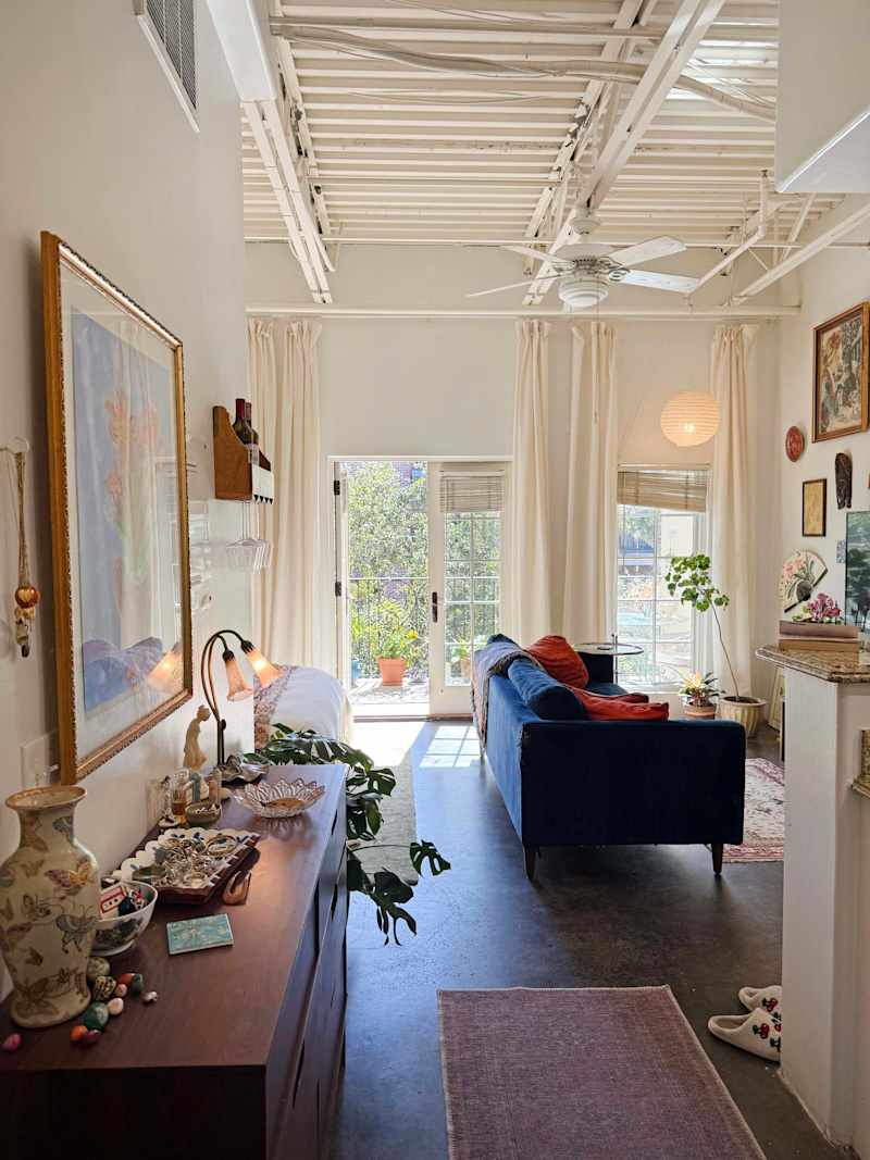 This 400-square-foot studio apartment has a massive balcony