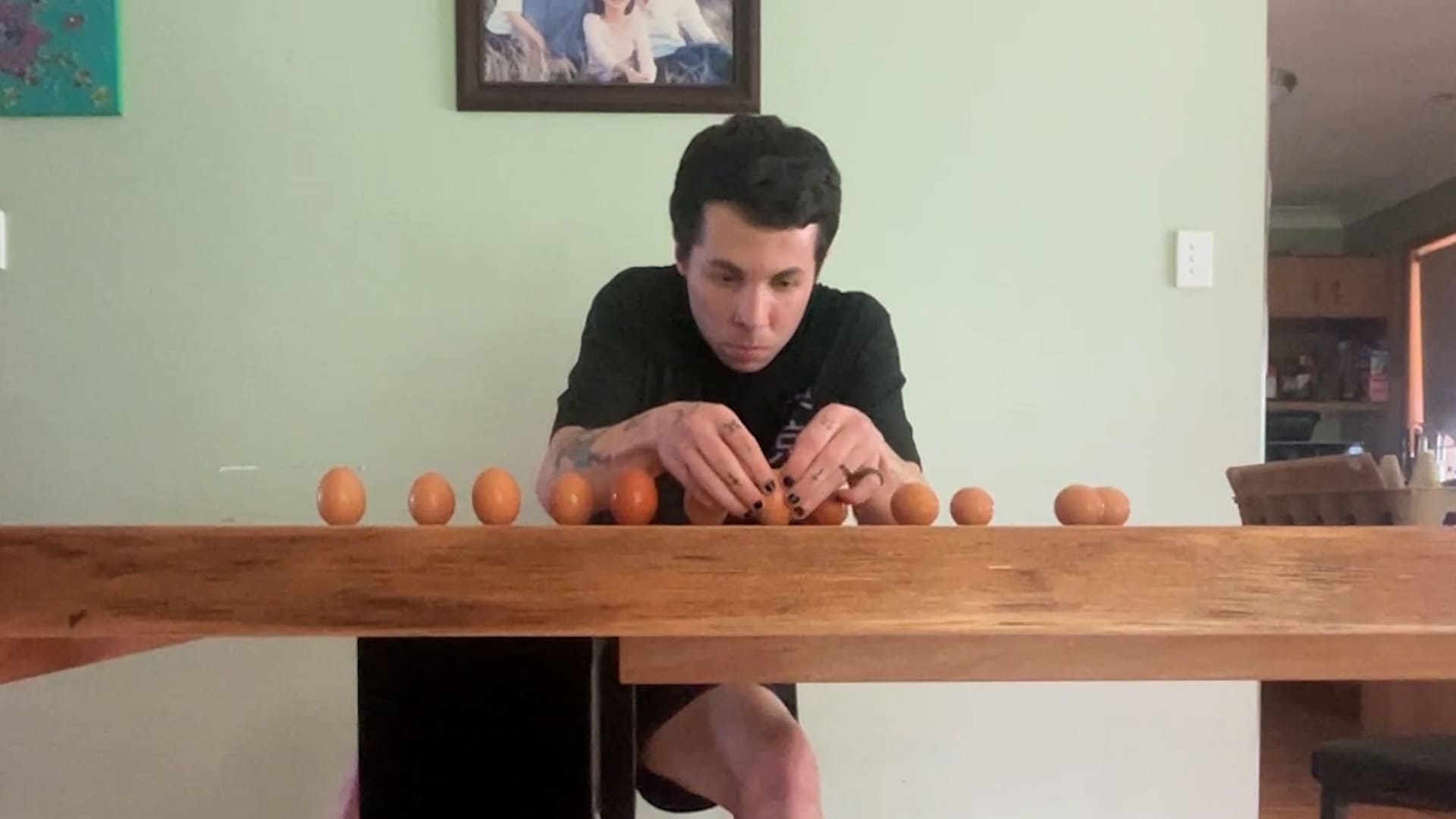 Brendan Kelbie balances 12 eggs in record time