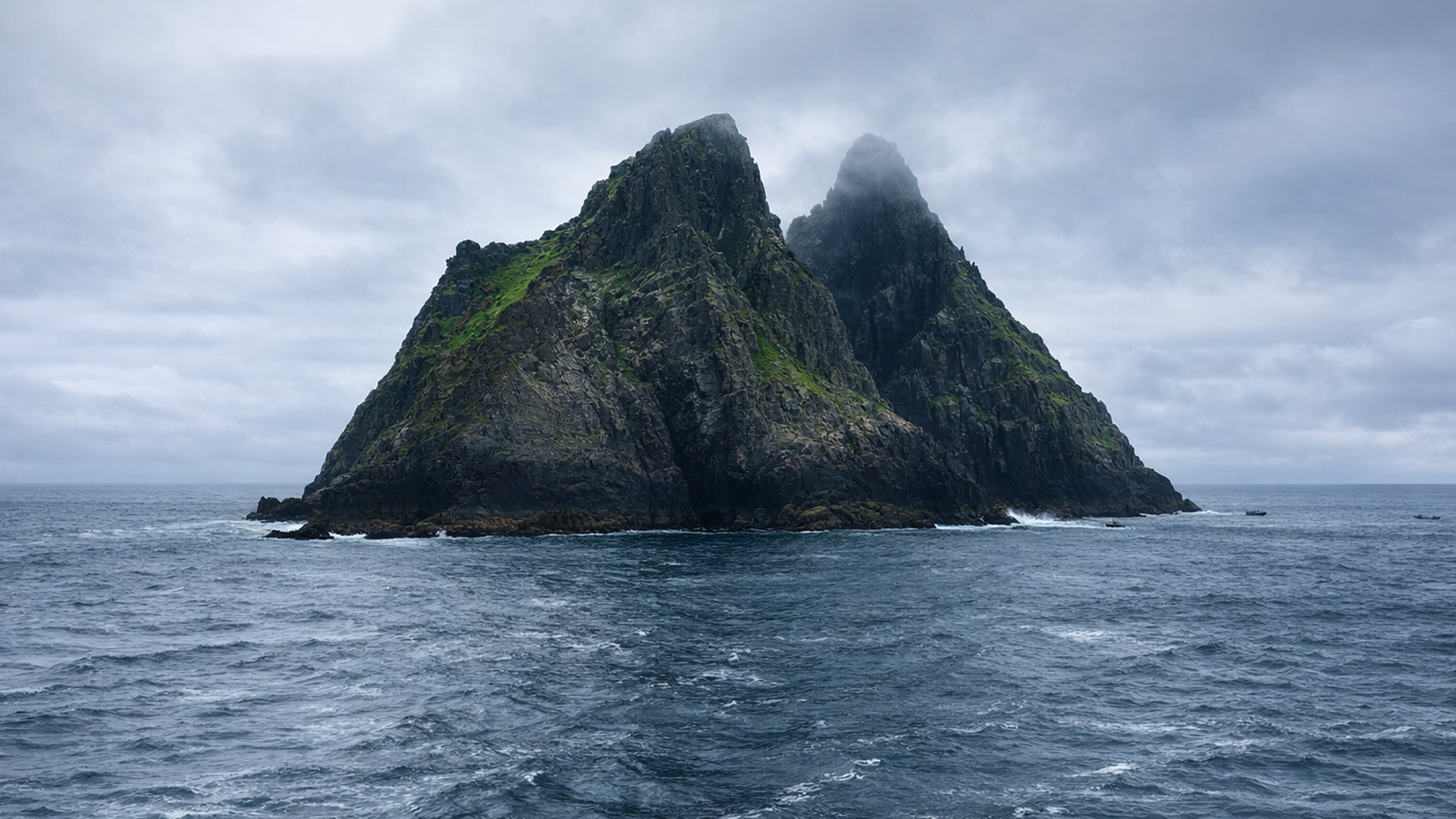 Jagged island rising alone in the open ocean