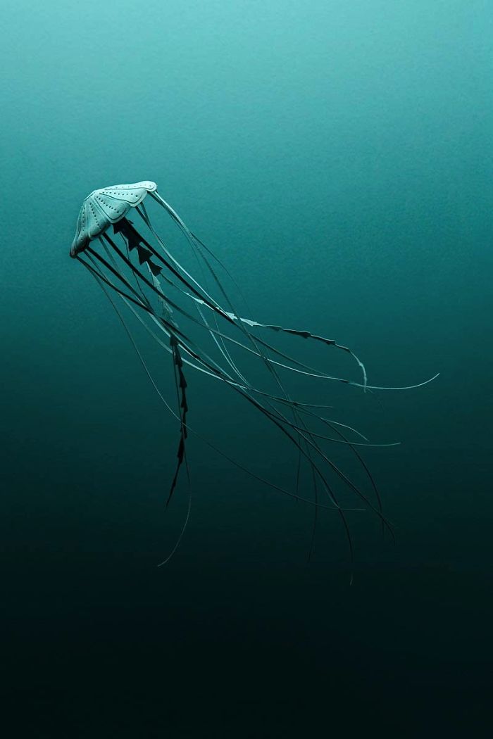 20 different artists created paper art pieces using only one color each