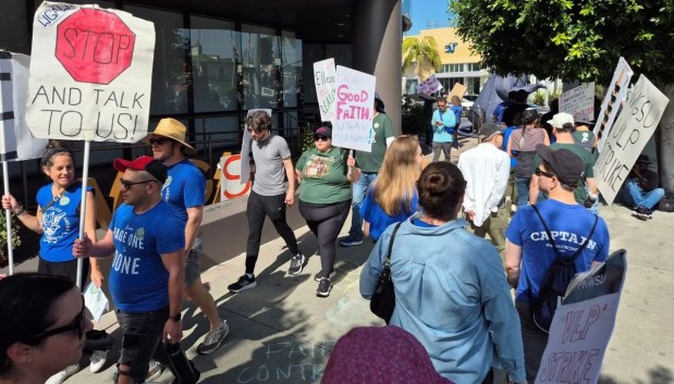 Writers Guild staffers picket union's first day of contract negotiations