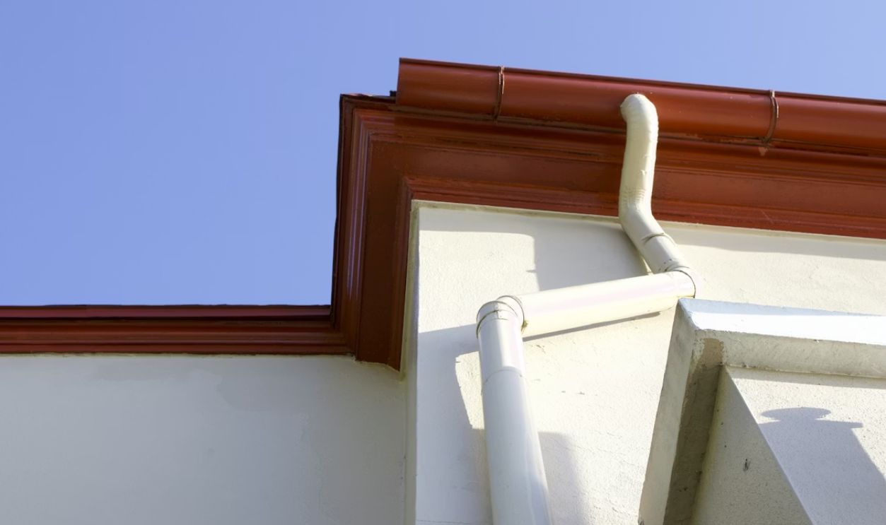 My neighbor's downspout points directly at our basement. He's refused ...