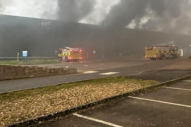 Road visibility and smoke warnings amid major fire response to ...