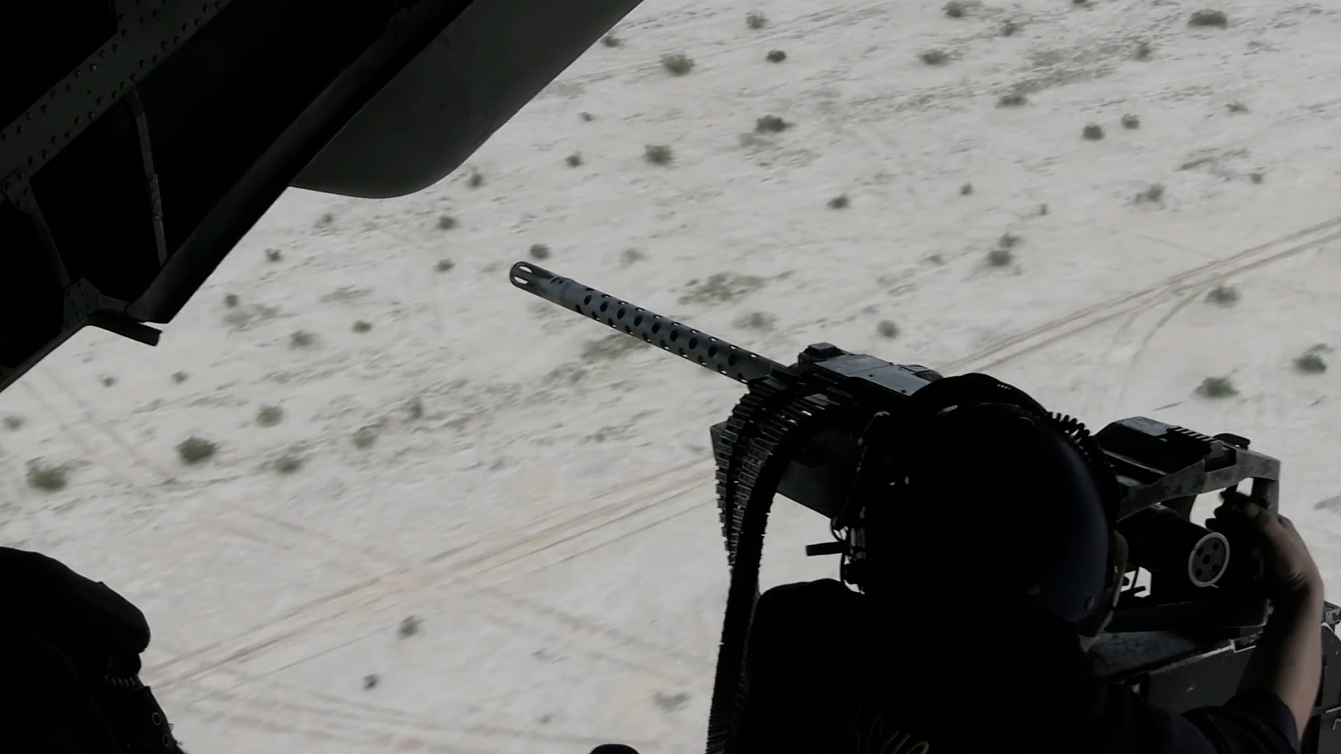 The powerful .50 cal machine gun of the CH-53E in action