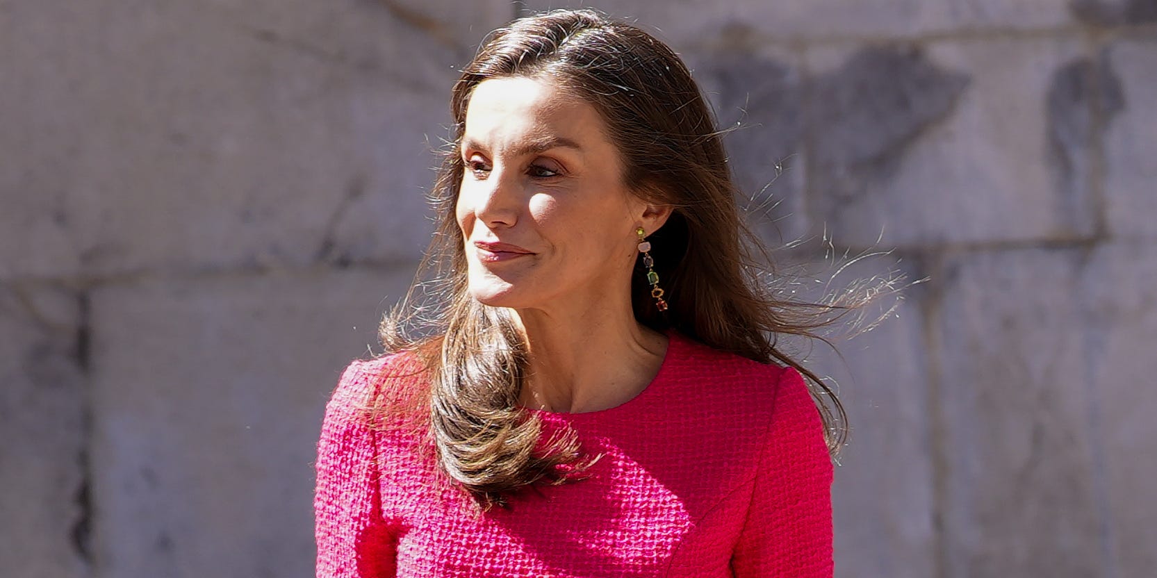 Queen Letizia rewears a hot-pink tweed midi dress just in time for spring