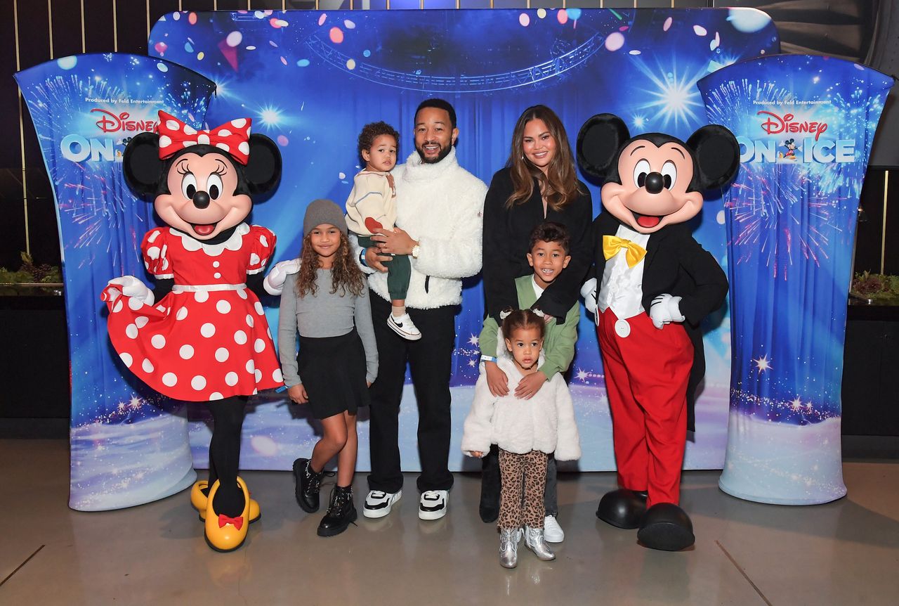 John Legend's son Miles is his literal twin with long wavy hair during ...
