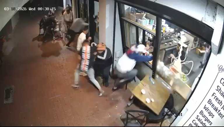 CCTV captures the moment man shot outside Melbourne cafe