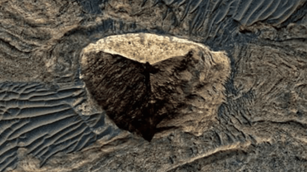 Space mystery as NASA uncovers mysterious ‘pyramid’ on Mars surface