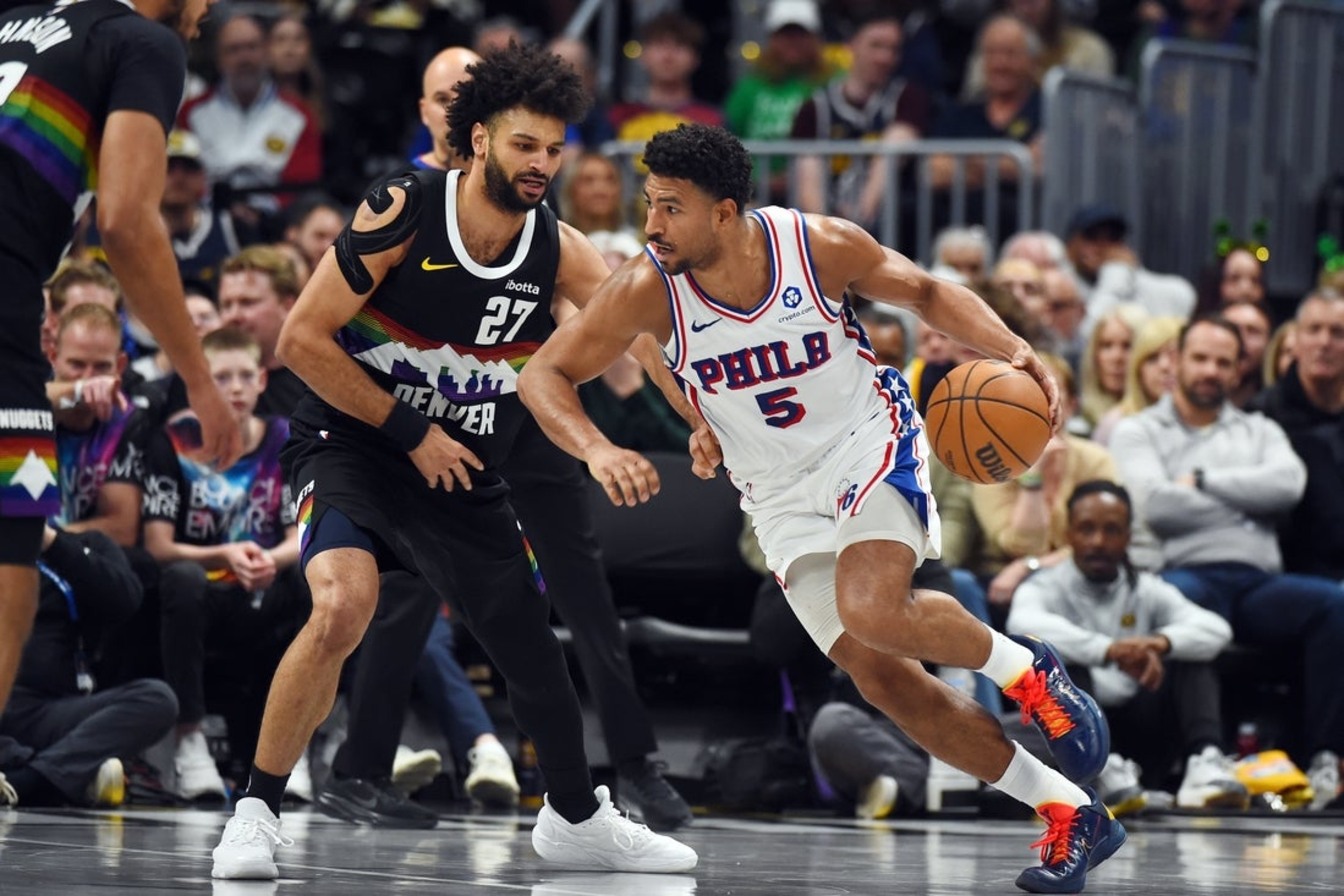 Nuggets score 72 first half points and rout short-handed 76ers