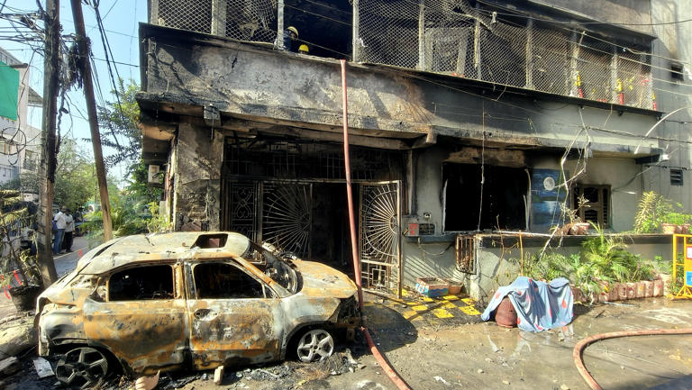 8 dead in fire after explosion at EV charging point in businessman's ...