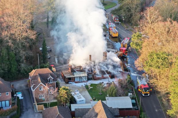 Emergency services still fighting thatch fire more than 19 hours later