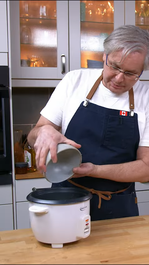 Watch this classic clay pot rice cook the traditional way