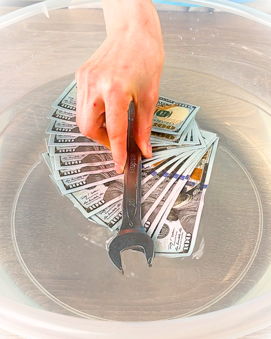 How many dollar bills does it take to hold a wrench 💵